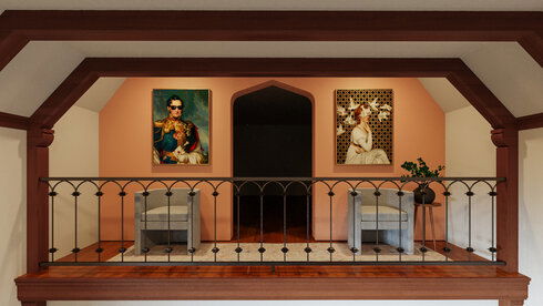 Vaulted Ceiling Tudor Living Room Design | Decorilla