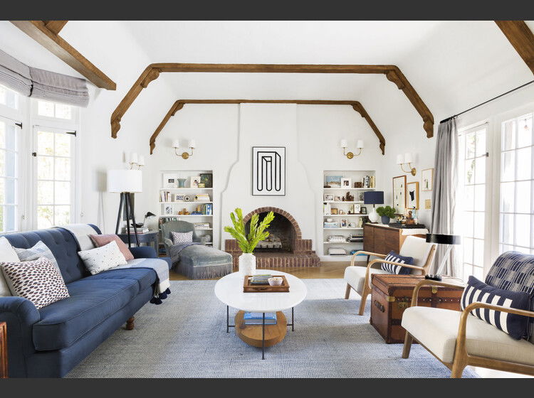 Vaulted Ceiling Tudor Living Room Design | Decorilla