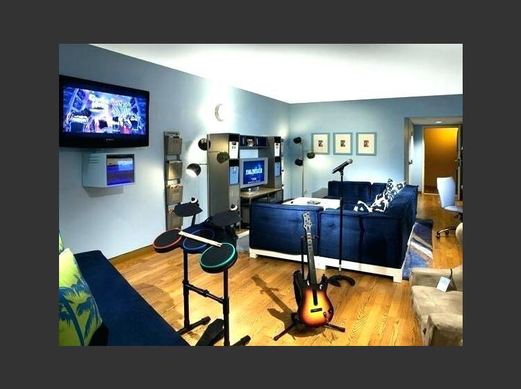 Living room and Play Room With Blue Accents | Decorilla