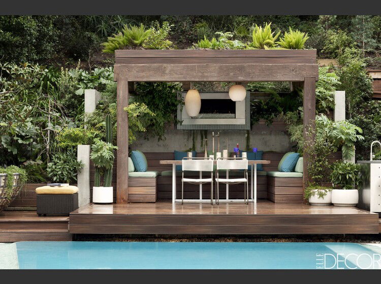 Relaxing Poolside Patio Decor with Wooden Ga... | Decorilla